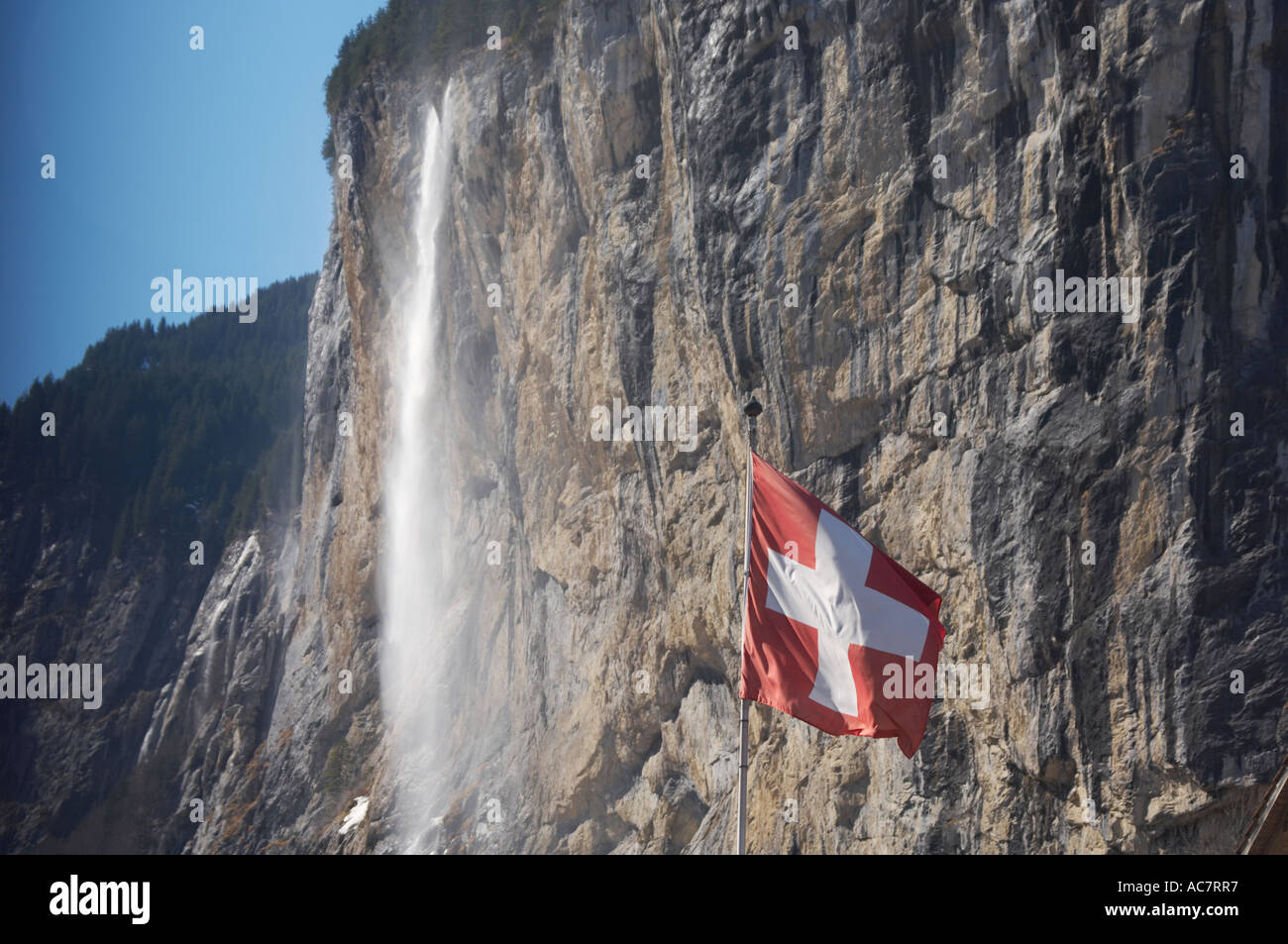 Swiss flag and Staubbach Waterfall Lauterbrunnen Bern Switzerland Stock ...