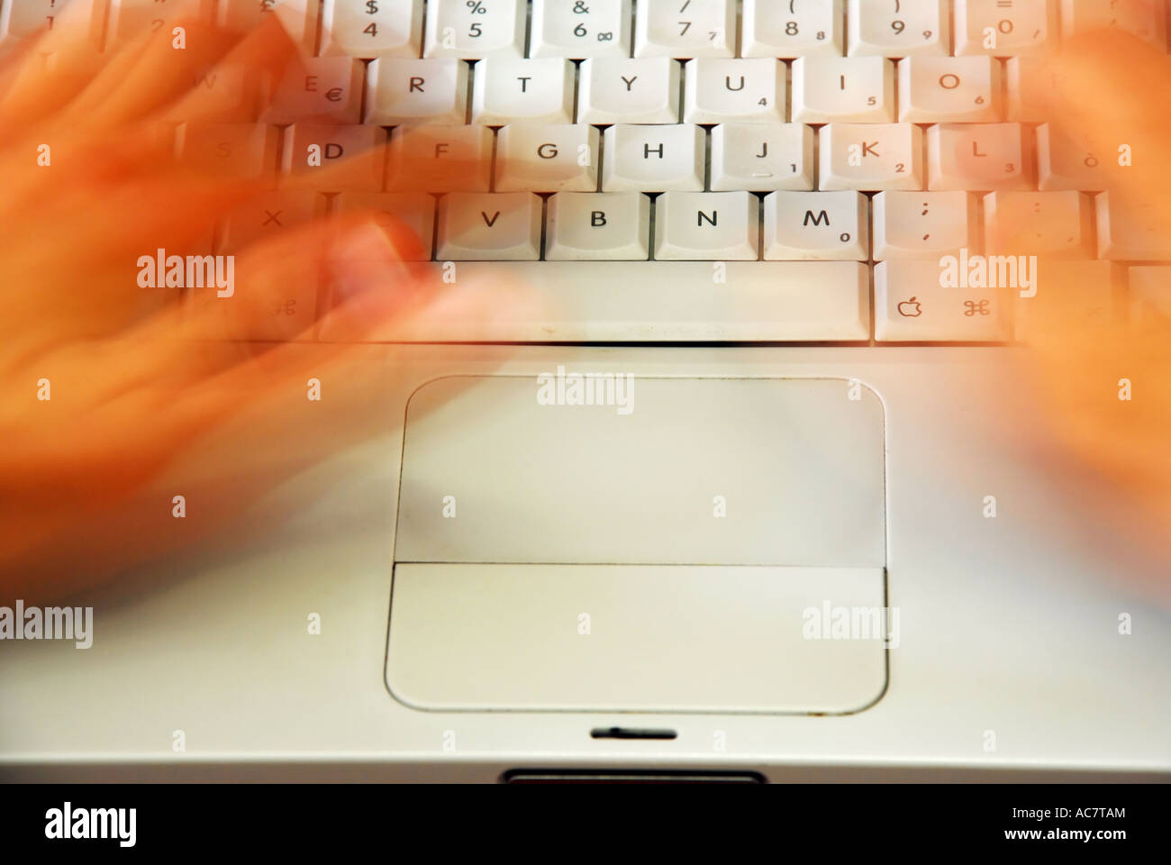 typing a mac Stock Photo - Alamy