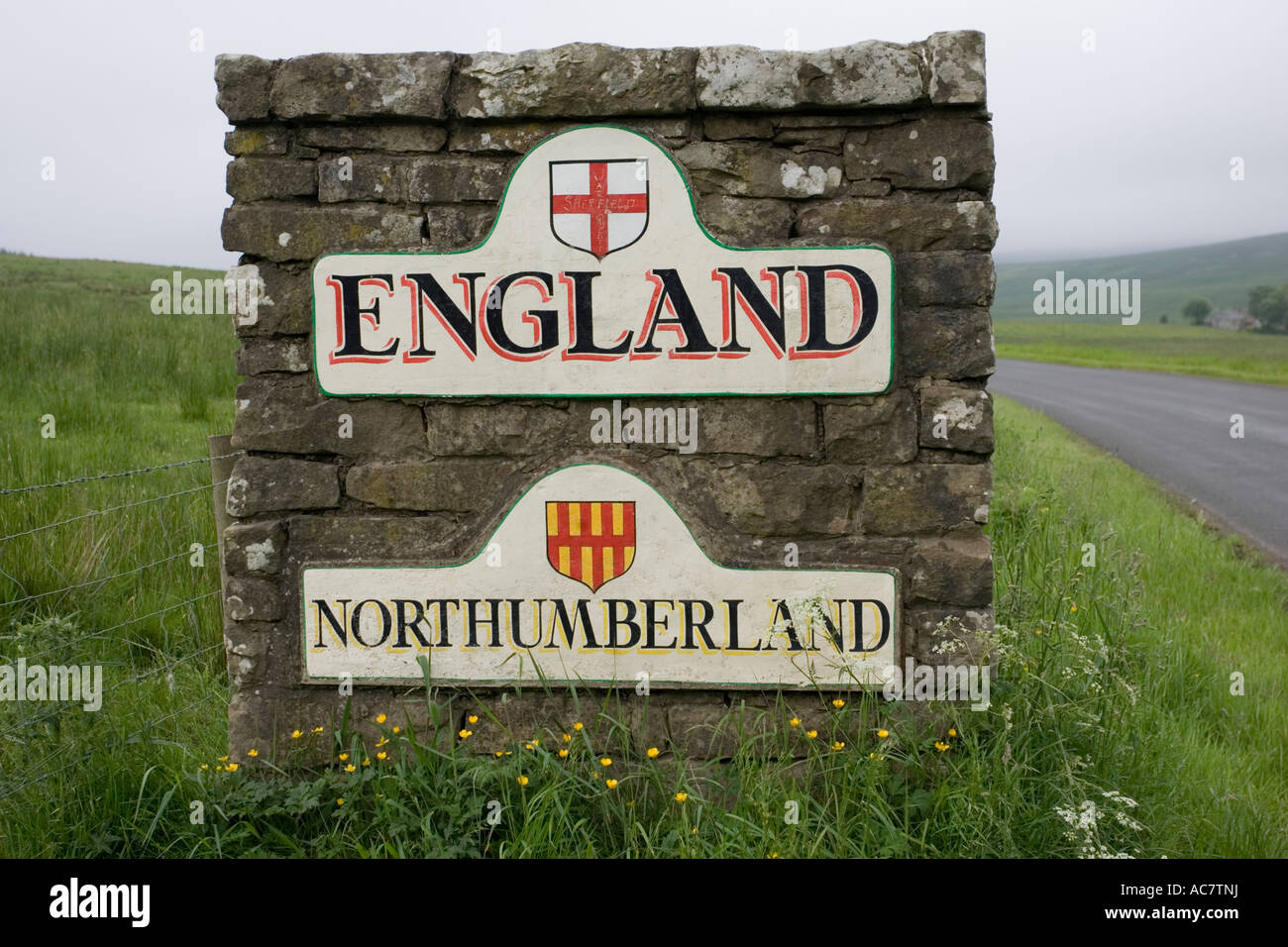Stone pillar on roadside marking English boundary Northumberland UK ...