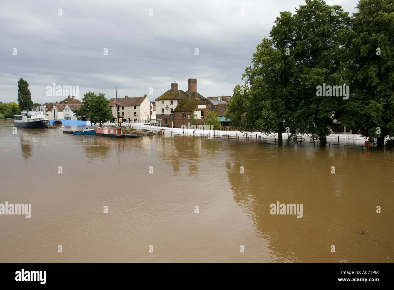 River Severn In Flood With Flood Barriers Erected In Upton Upon Severn