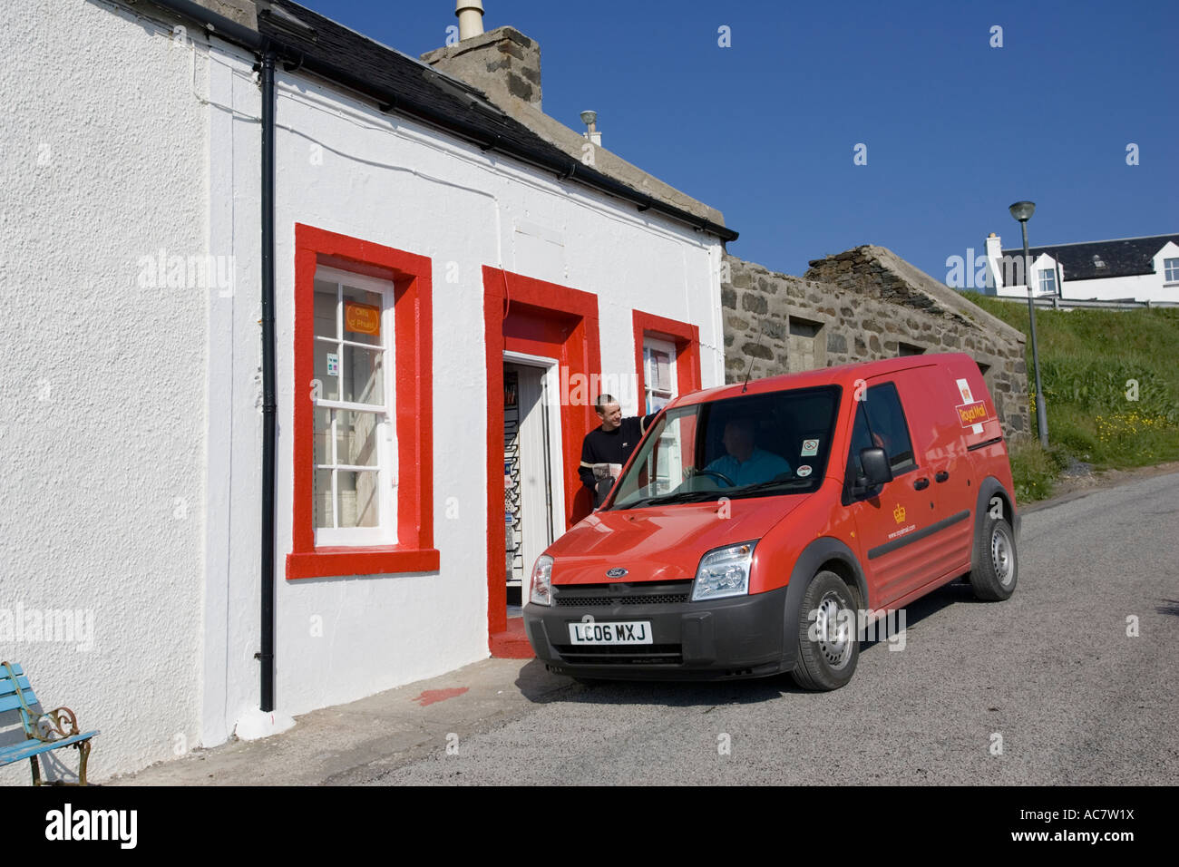 Mail van collecting post outside small rural post office and store ...