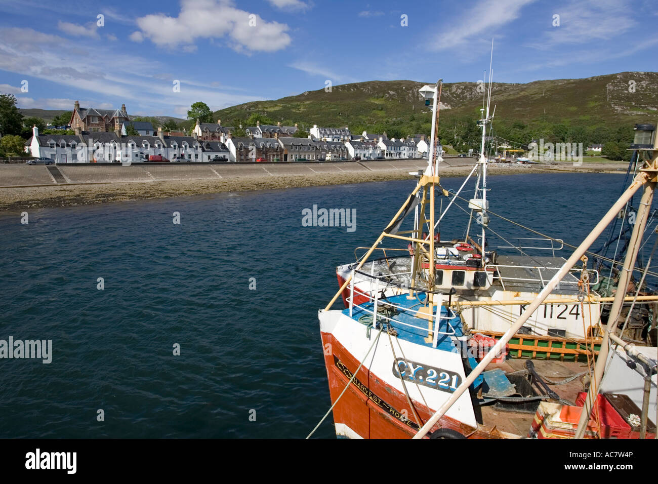Trawlers in harbour fishing port and coastal town of Ullapool North ...