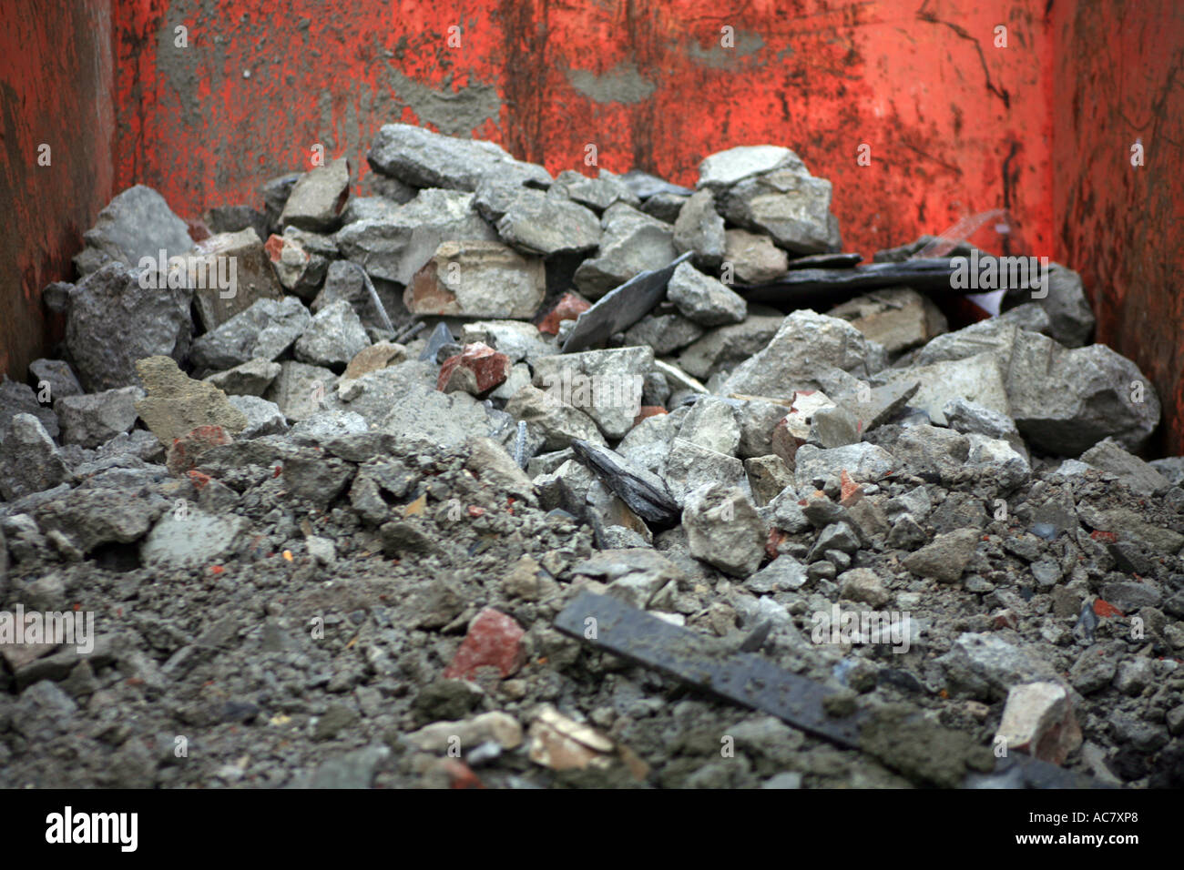 Rubble in a skip Stock Photo - Alamy