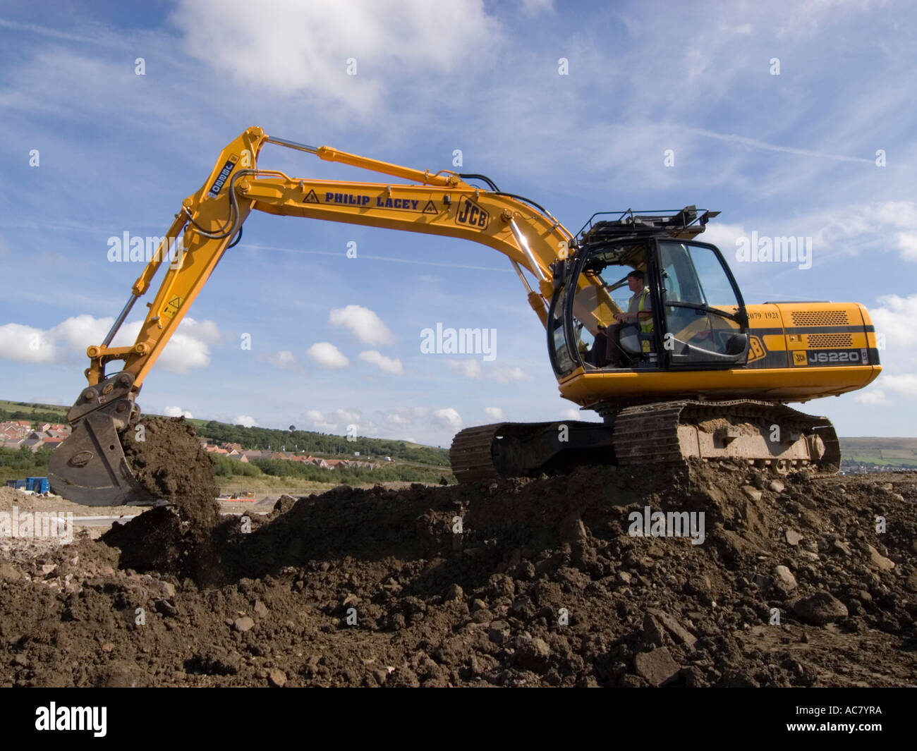 Tracked Excavator at work Stock Photo - Alamy