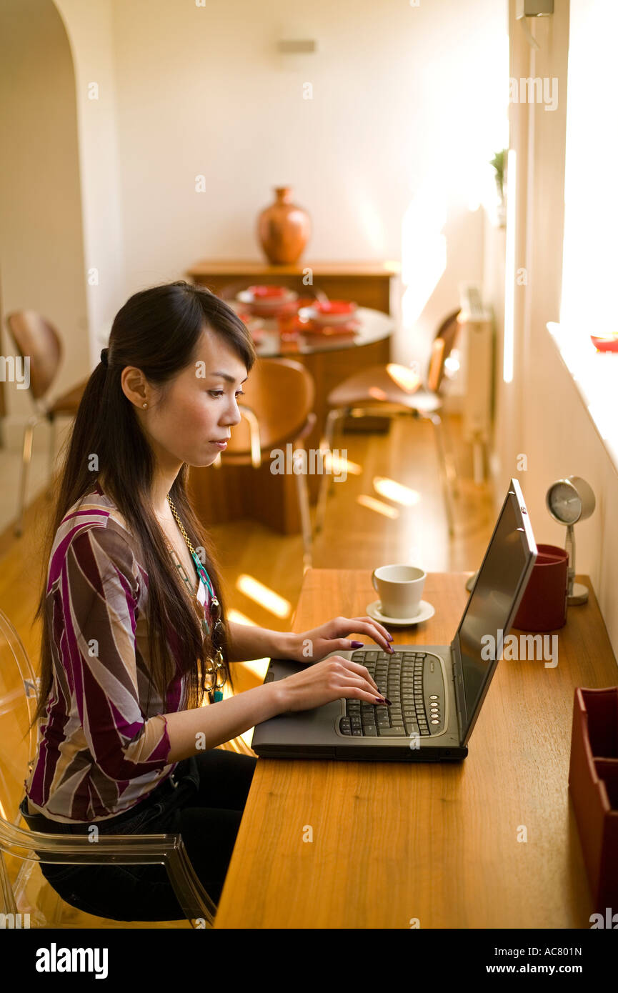 beautiful woman working at home with a laptop computer Stock Photo - Alamy