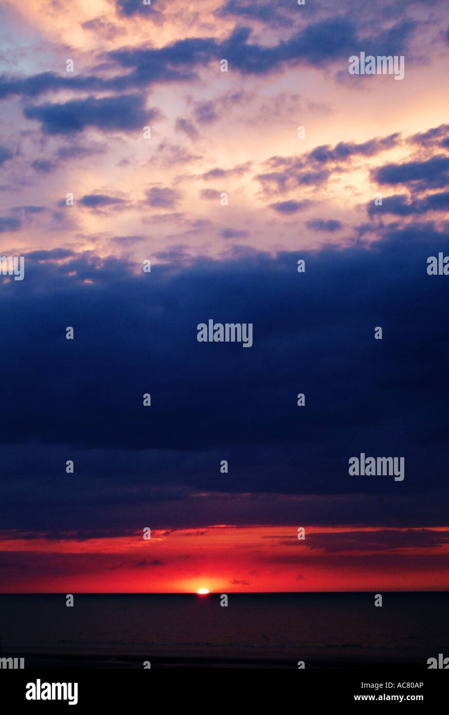 Sunset over sea Stock Photo - Alamy