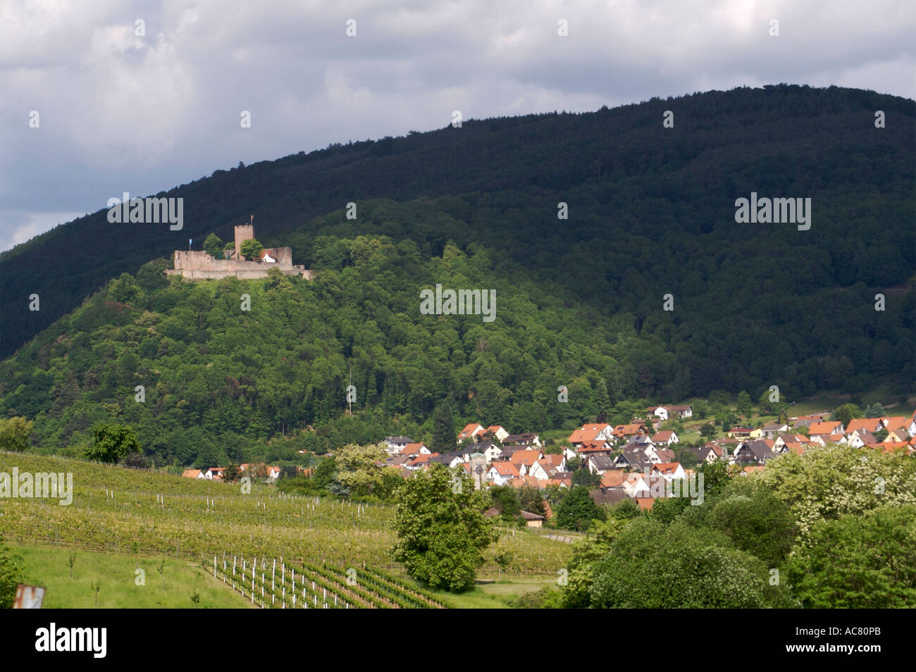 Landscape with castle and small village Stock Photo - Alamy