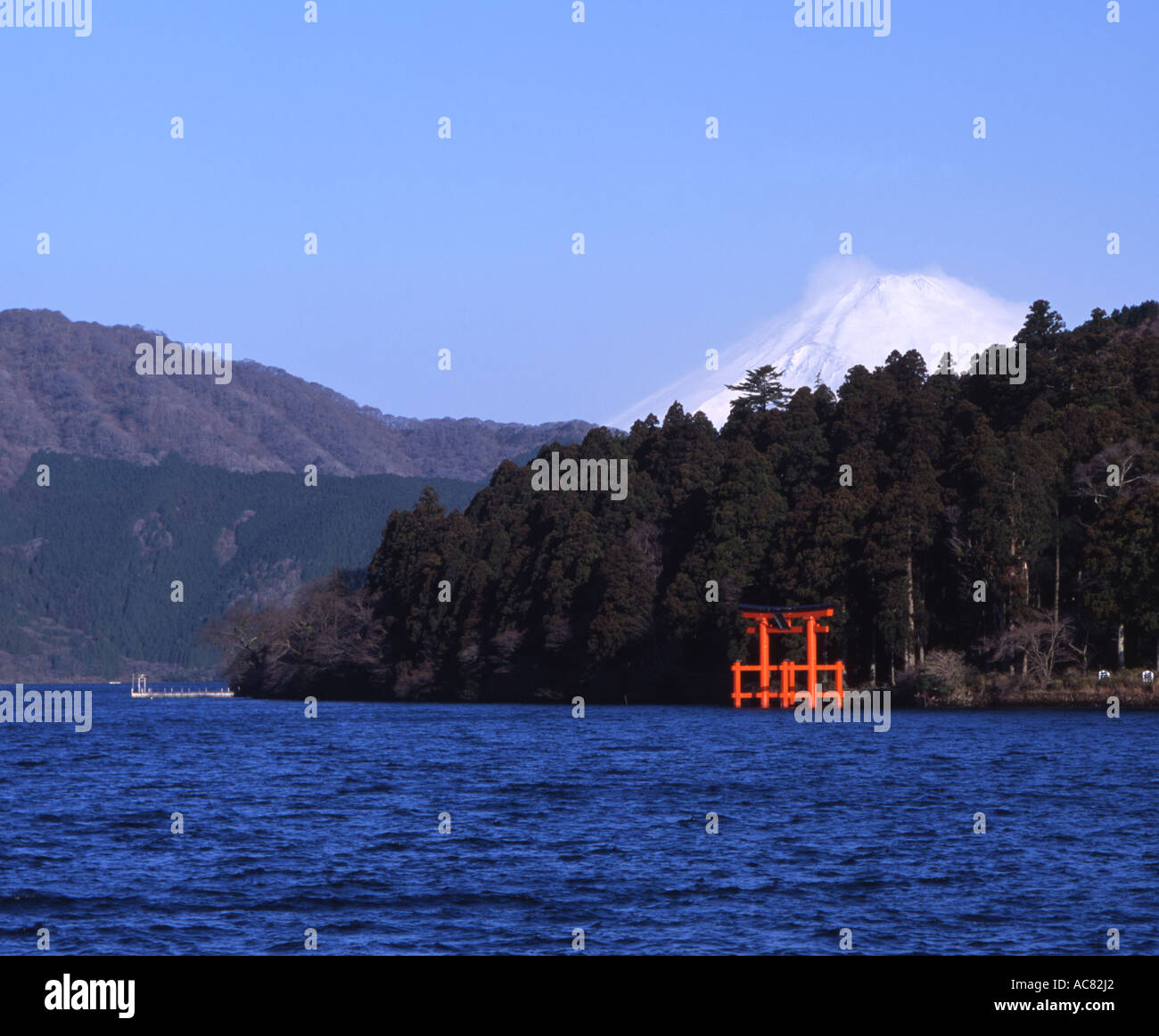 Lake Ashi with red torii and Mount Fuji on the horizon. Hakone, Japan ...