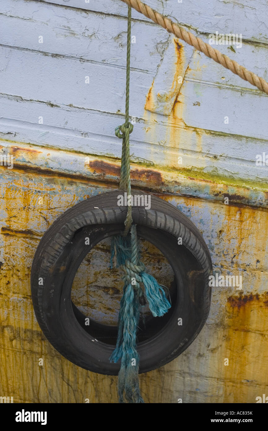 Close up of tyre on old fishing boat Stock Photo - Alamy