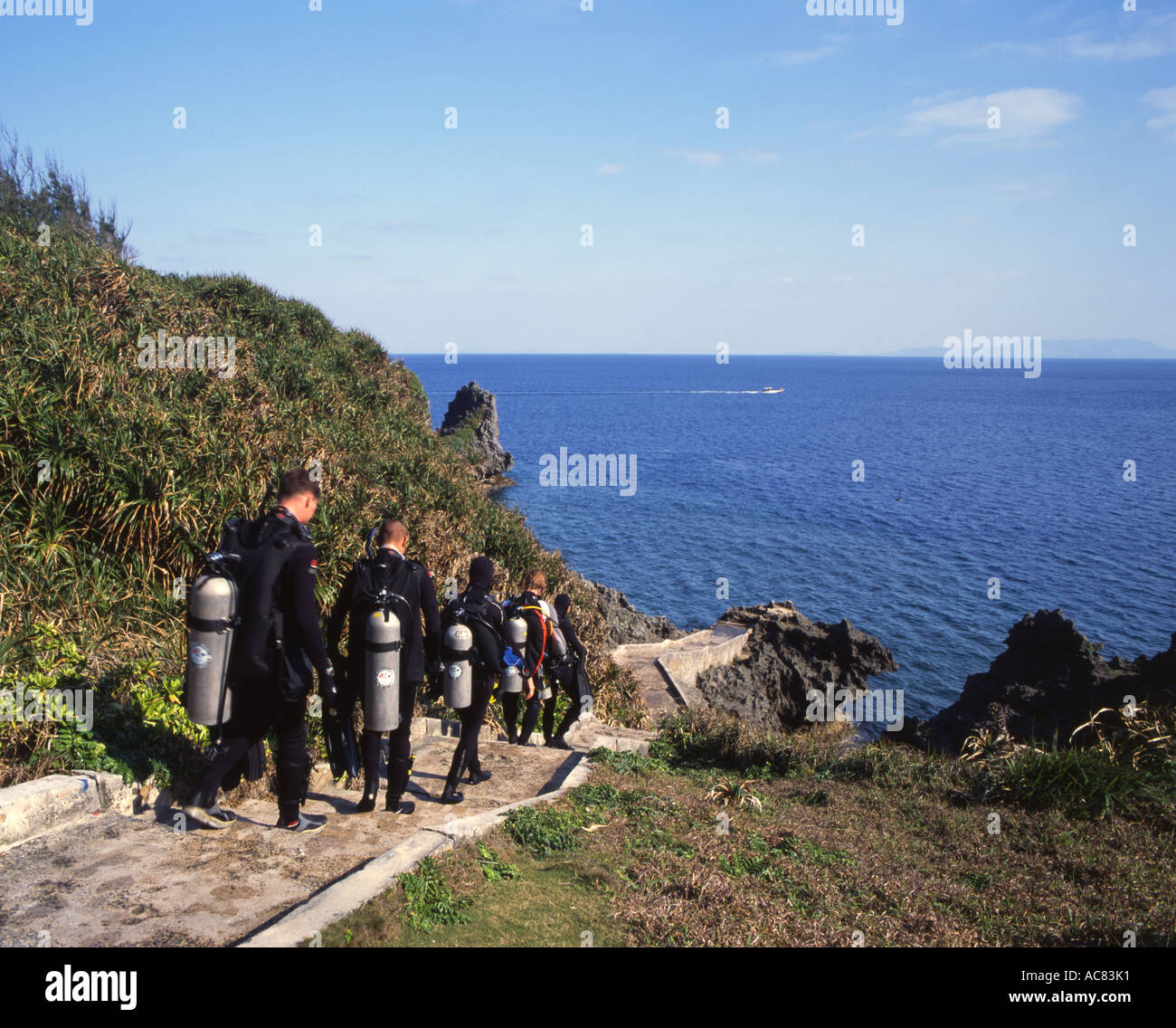Scuba divers descend down the steps to Maeda Point - Maeda Misaki ...