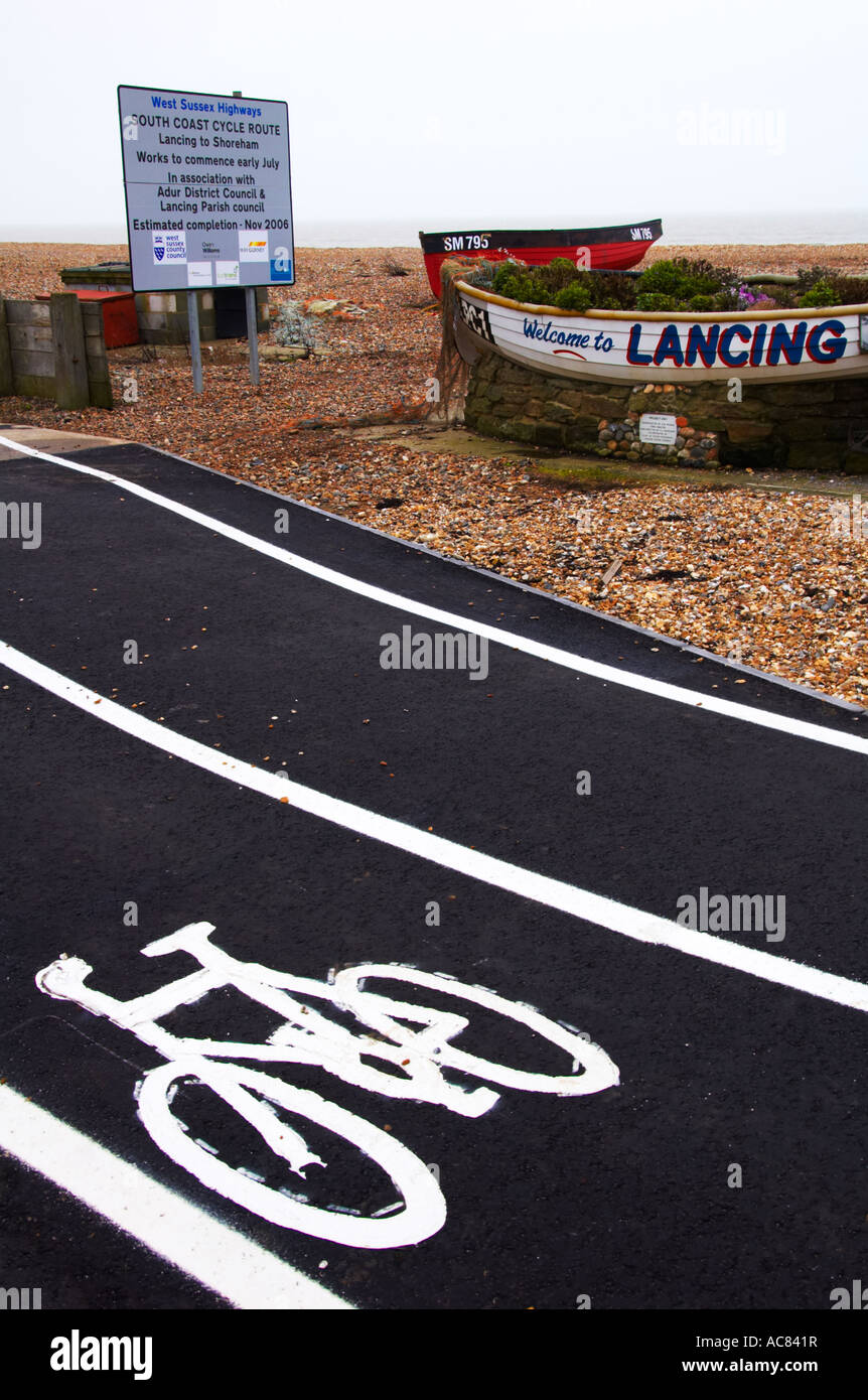 The cycle path on Lancing seafront with sign behind showing estimated ...