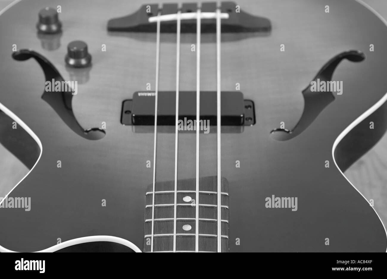 detail of a bass guitar Stock Photo - Alamy