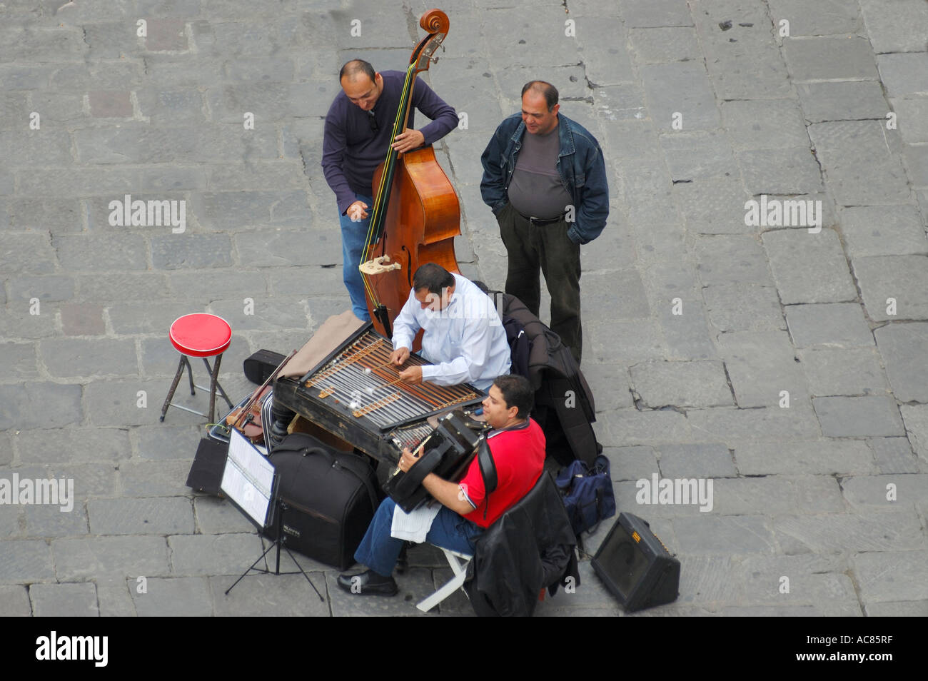 Men playing in a band Stock Photo - Alamy