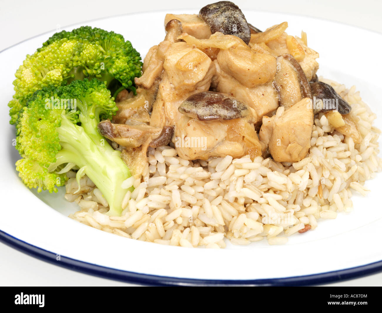 Chicken Stroganoff with Brown Rice Broccoli Stock Photo - Alamy