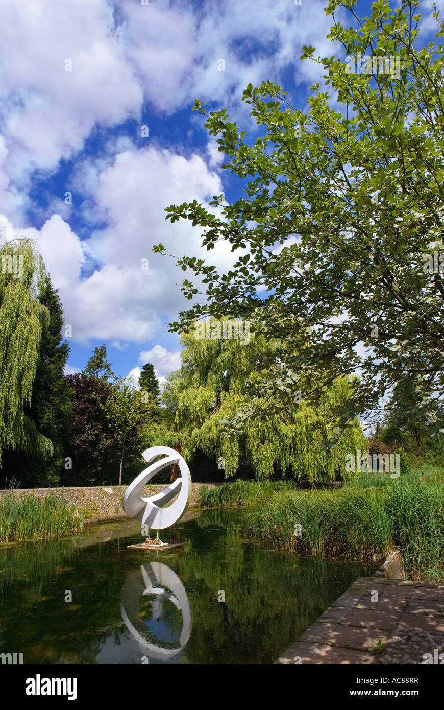 Sculpture Public art in Landscaped town park Harlow Essex UK Stock ...