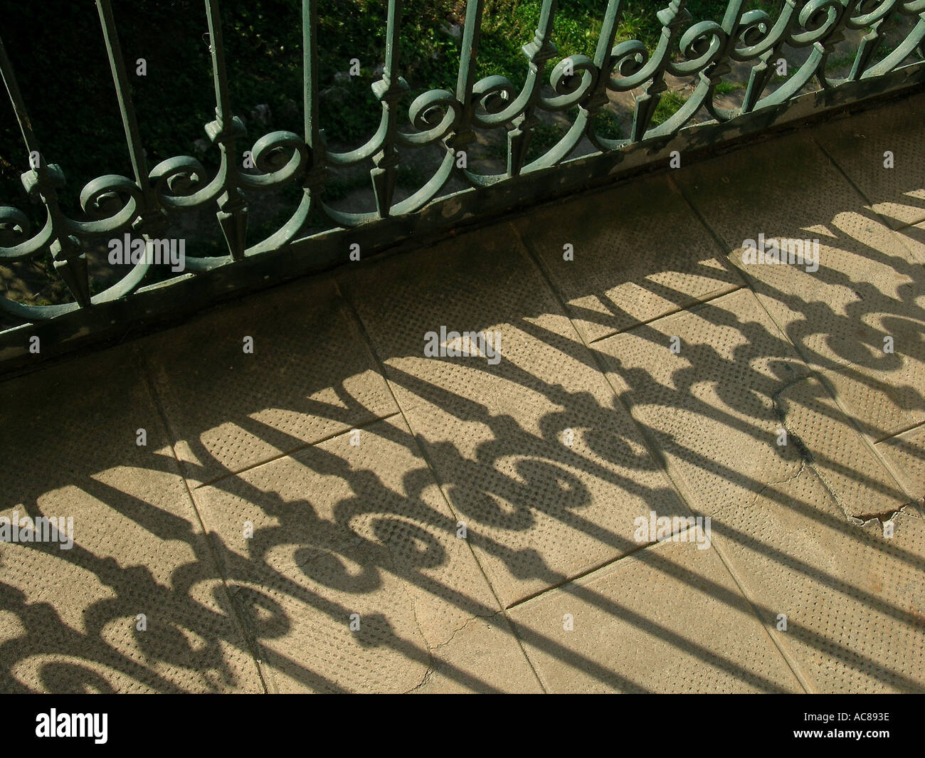Shadows of a hand rail Stock Photo - Alamy