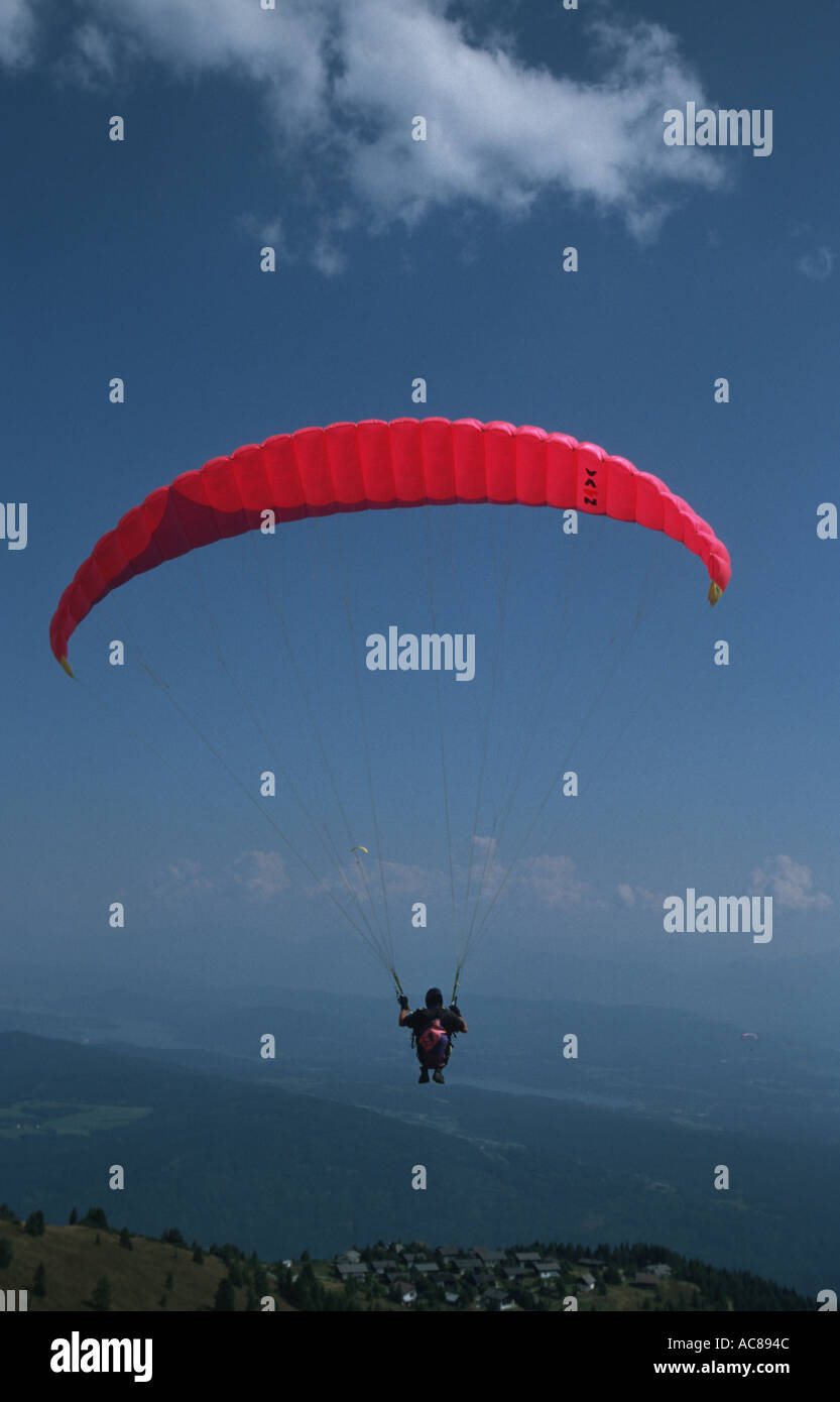 Paragliding in red Stock Photo - Alamy