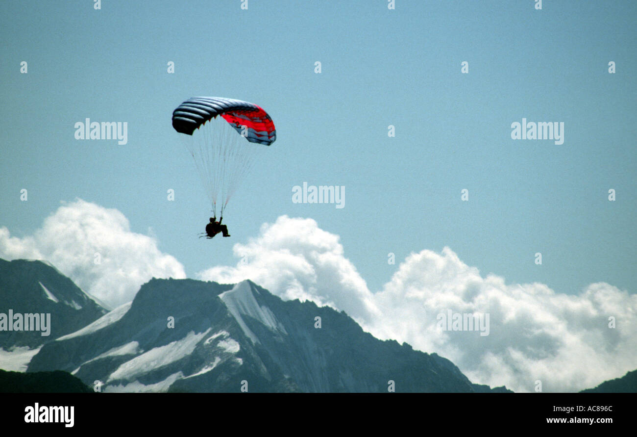 Para gliding in the Alps Stock Photo - Alamy
