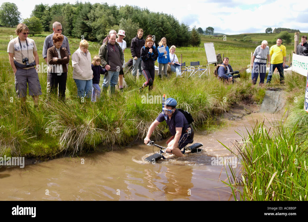 Competitor in the annual World Mountain Bike Bog Snorkelling ...