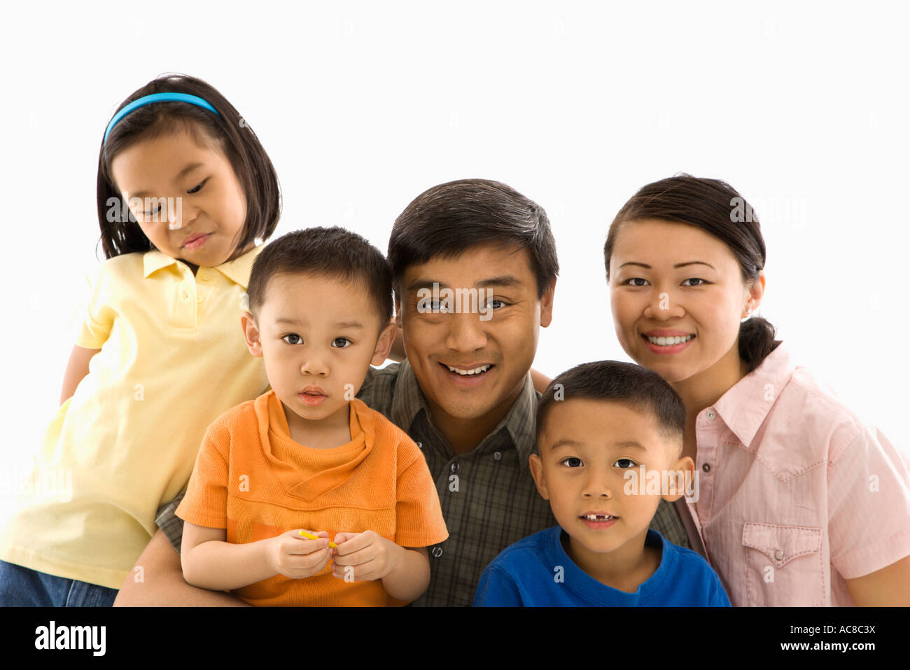 Asian family portrait against white background Stock Photo - Alamy
