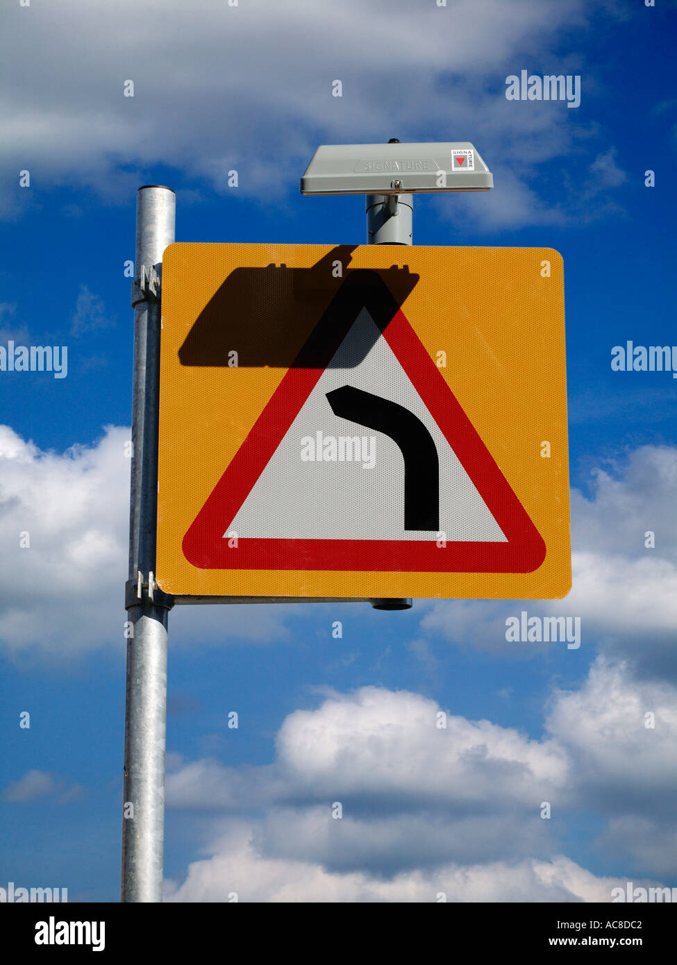 LEFT TURN ROAD TRAFFIC SIGN Stock Photo - Alamy