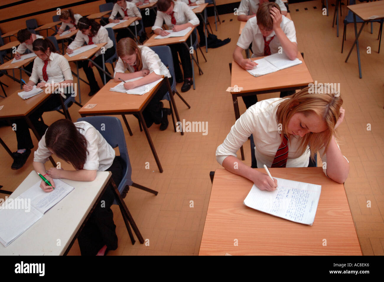 British school pupils in exam conditions in a school hall Stock Photo ...