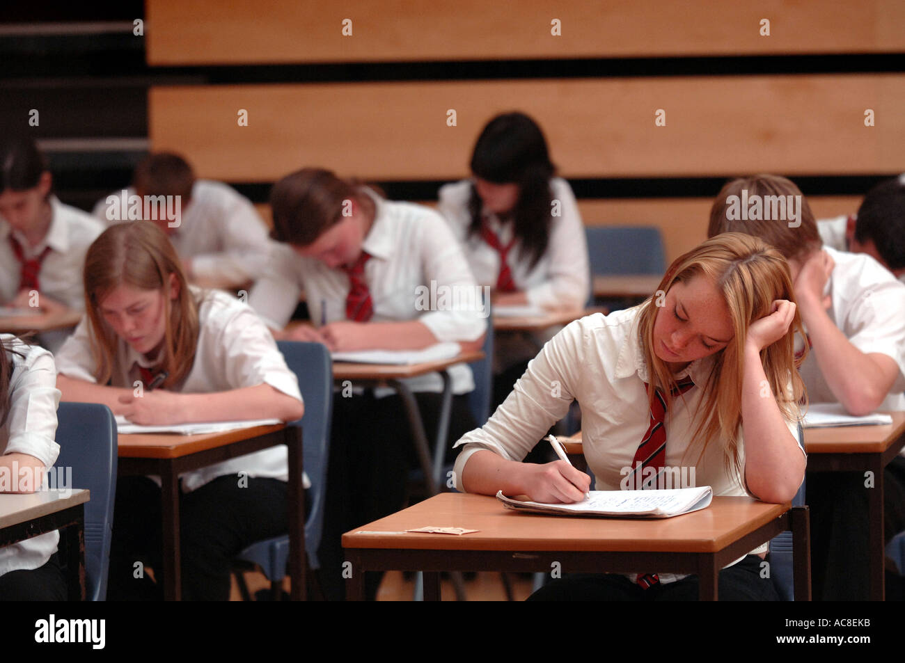 British school pupils in exam conditions in a school hall Stock Photo ...