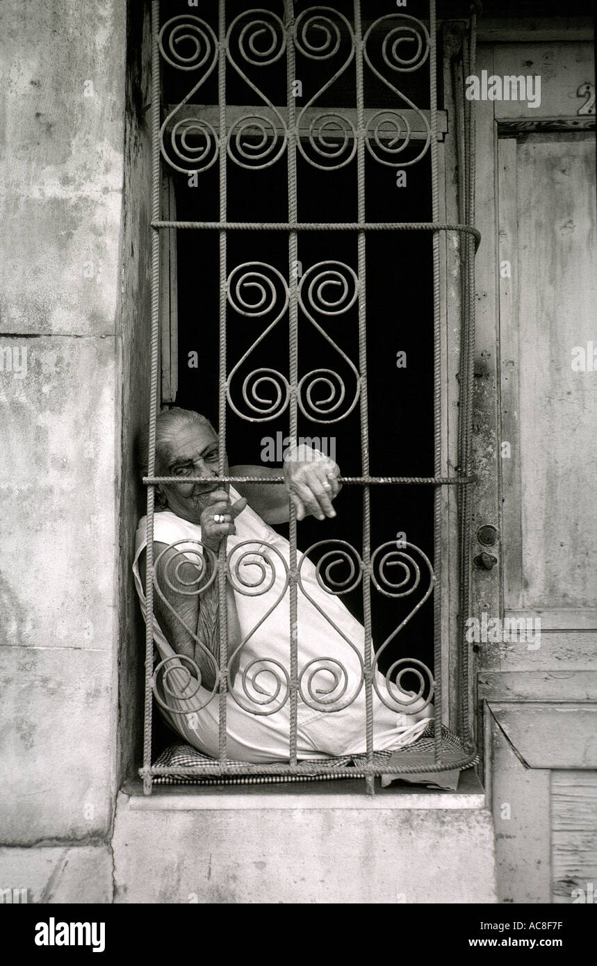 Woman behind bars hi-res stock photography and images - Alamy