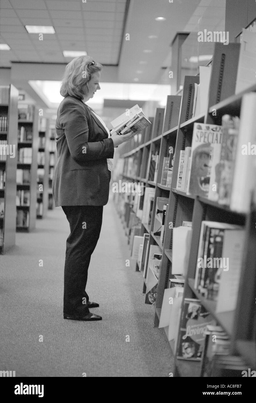 Shopper store shelf Black and White Stock Photos & Images - Alamy