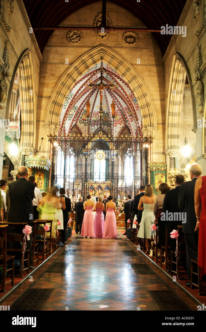 Bride and Groom at the altar Stock Photo - Alamy