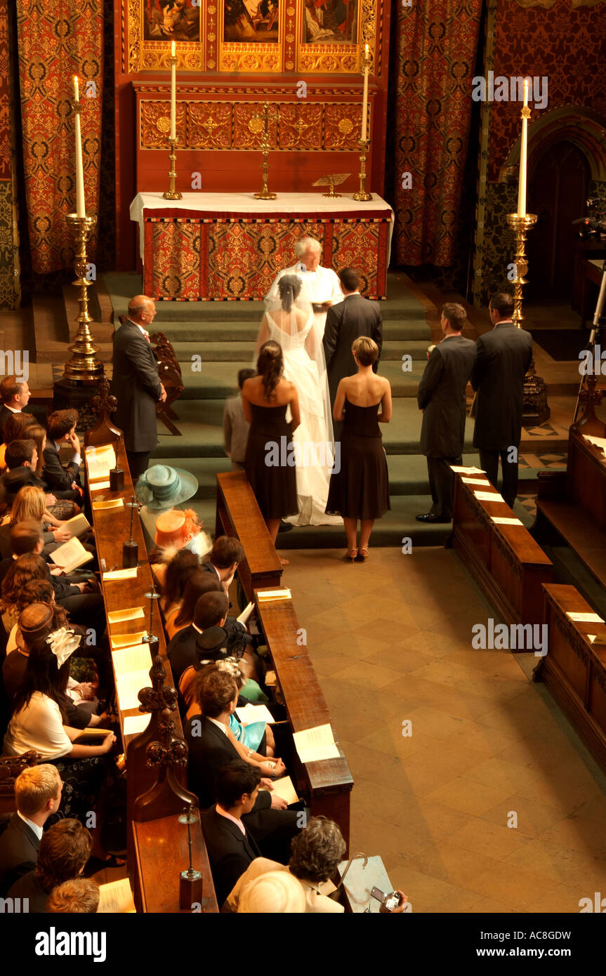 Bride and Groom at the altar Stock Photo - Alamy