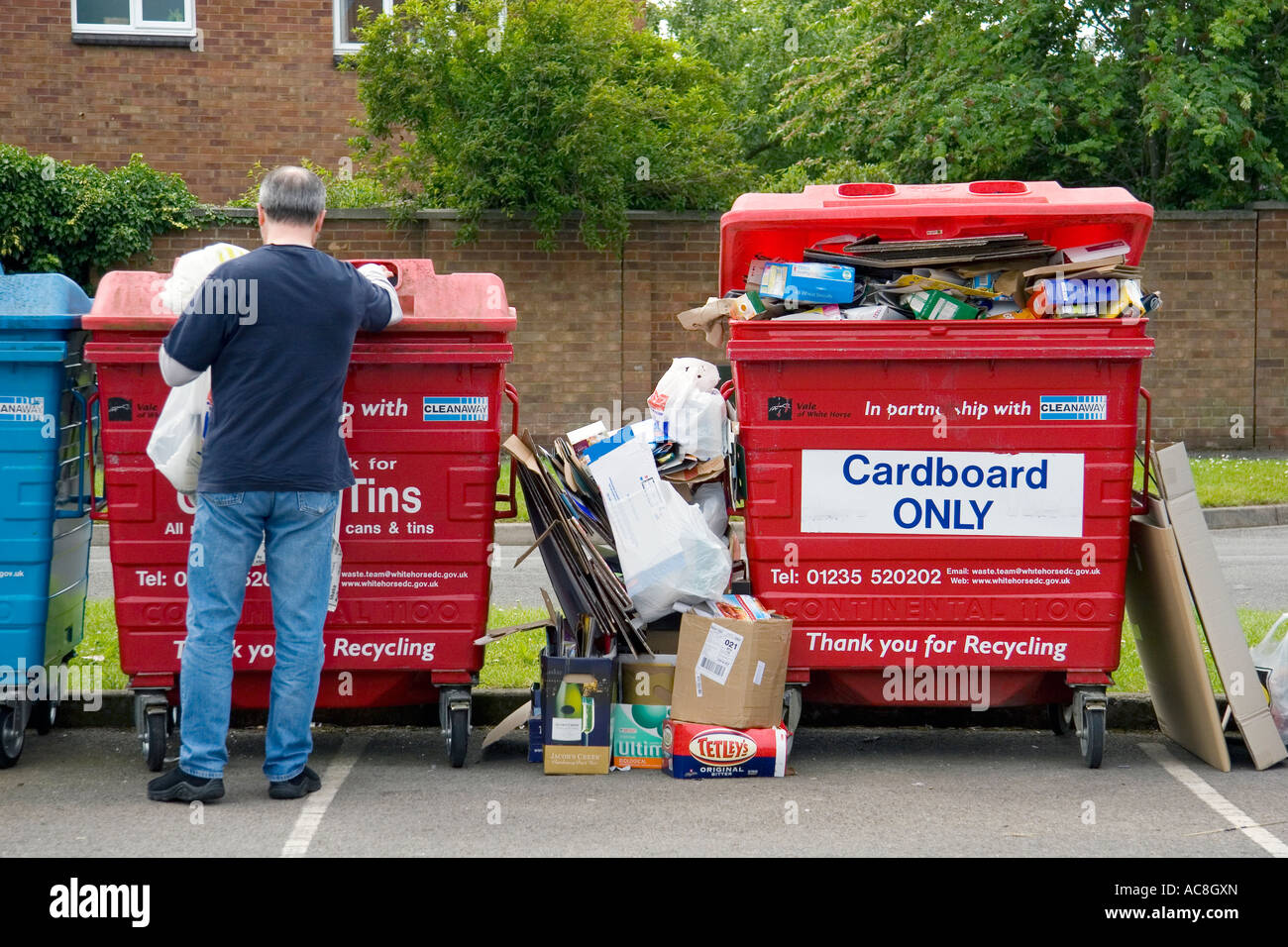 Overflowing waste recycling point in Oxfordshire housing estate 5 Stock ...