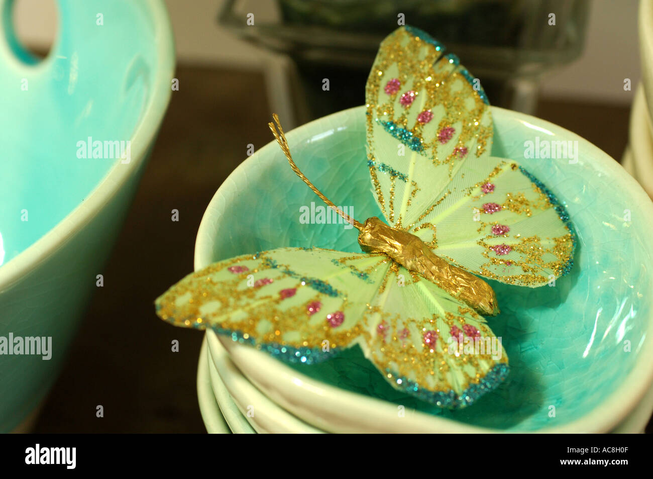 Ornamental Butterfly in a bowl Stock Photo - Alamy