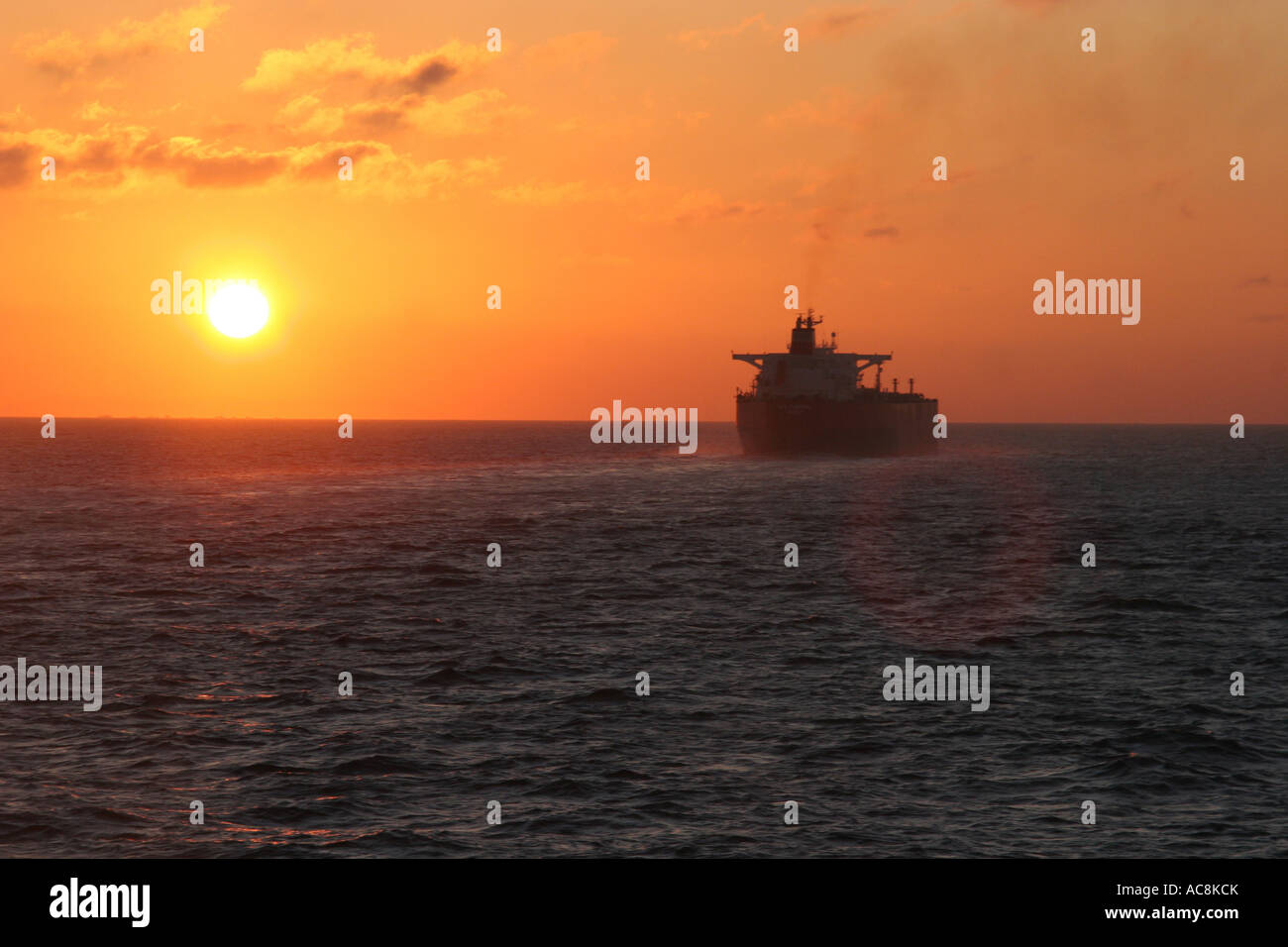 Sun and ship Stock Photo - Alamy