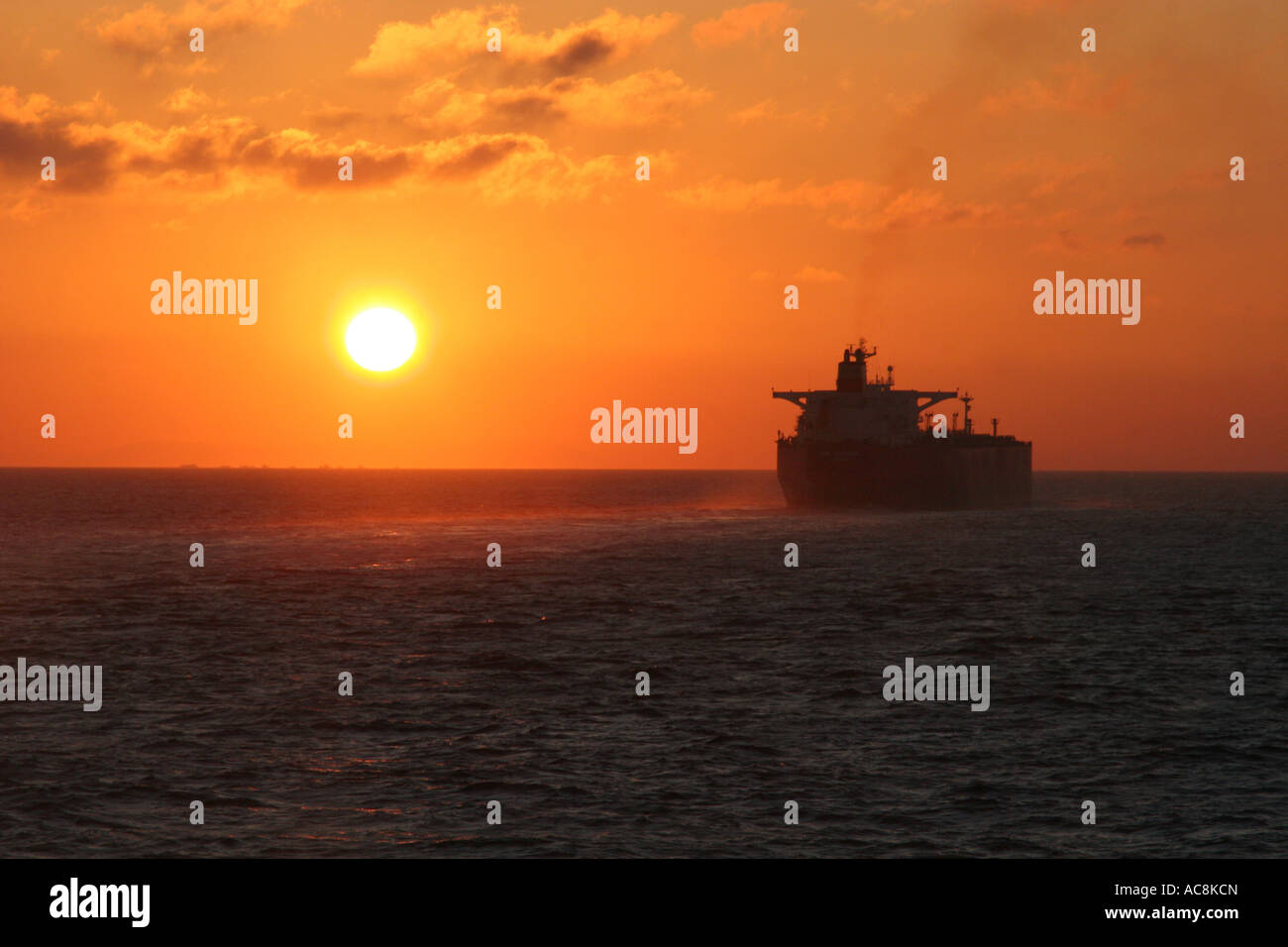 Sun and ship Stock Photo - Alamy