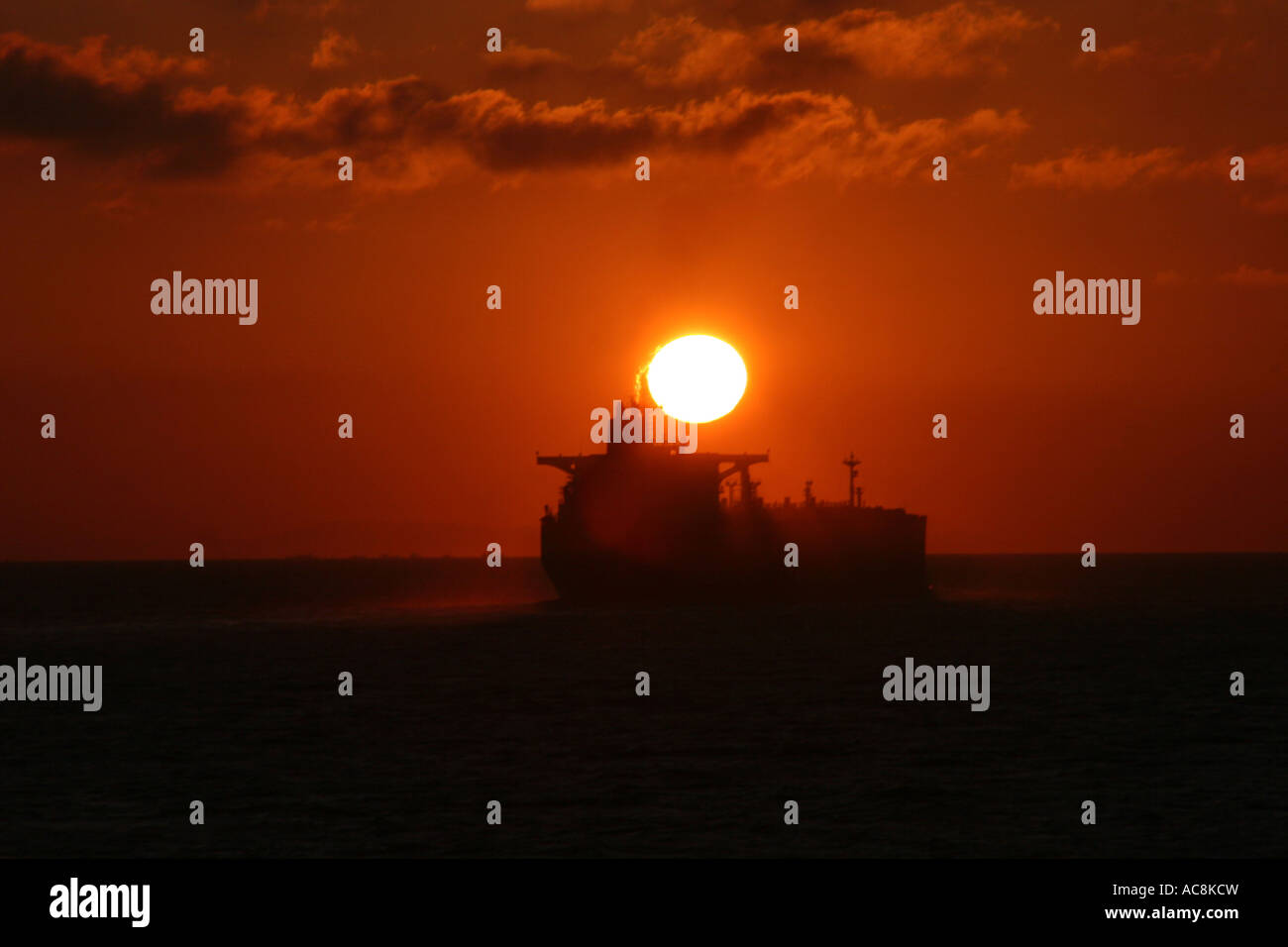 Sun and ship Stock Photo - Alamy