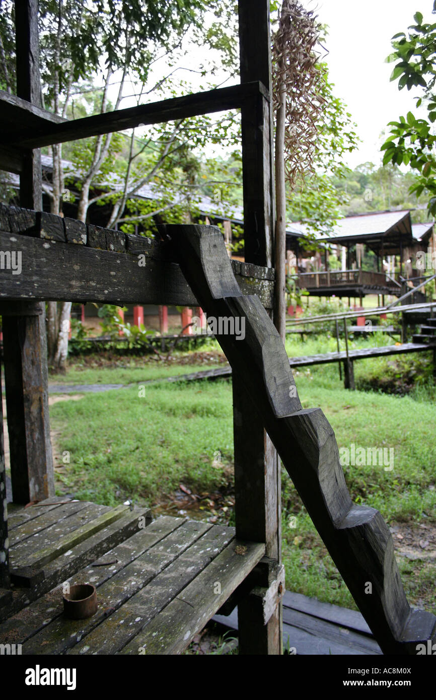 A ladder carved from solid wood in a native home in Sarawak, Malaysia ...