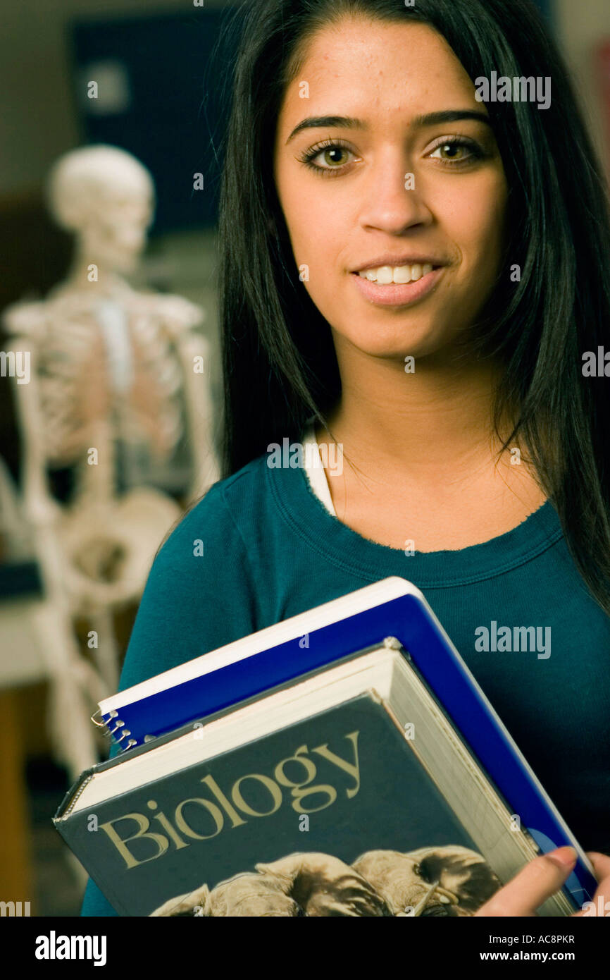 Young student looking books hi-res stock photography and images - Alamy