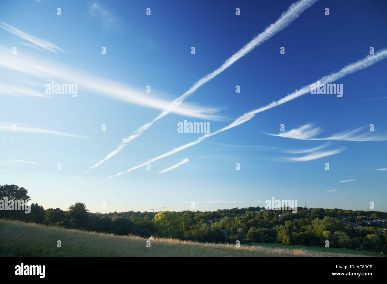 aircraft airplane contrails in sky Stock Photo - Alamy