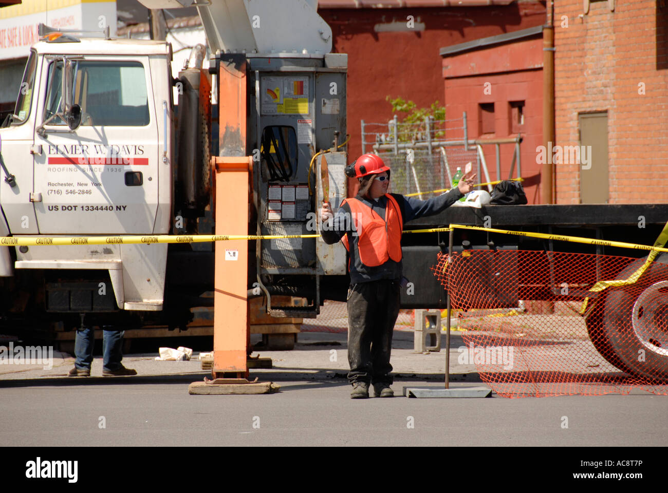 Directing traffic, stop sign Stock Photo - Alamy