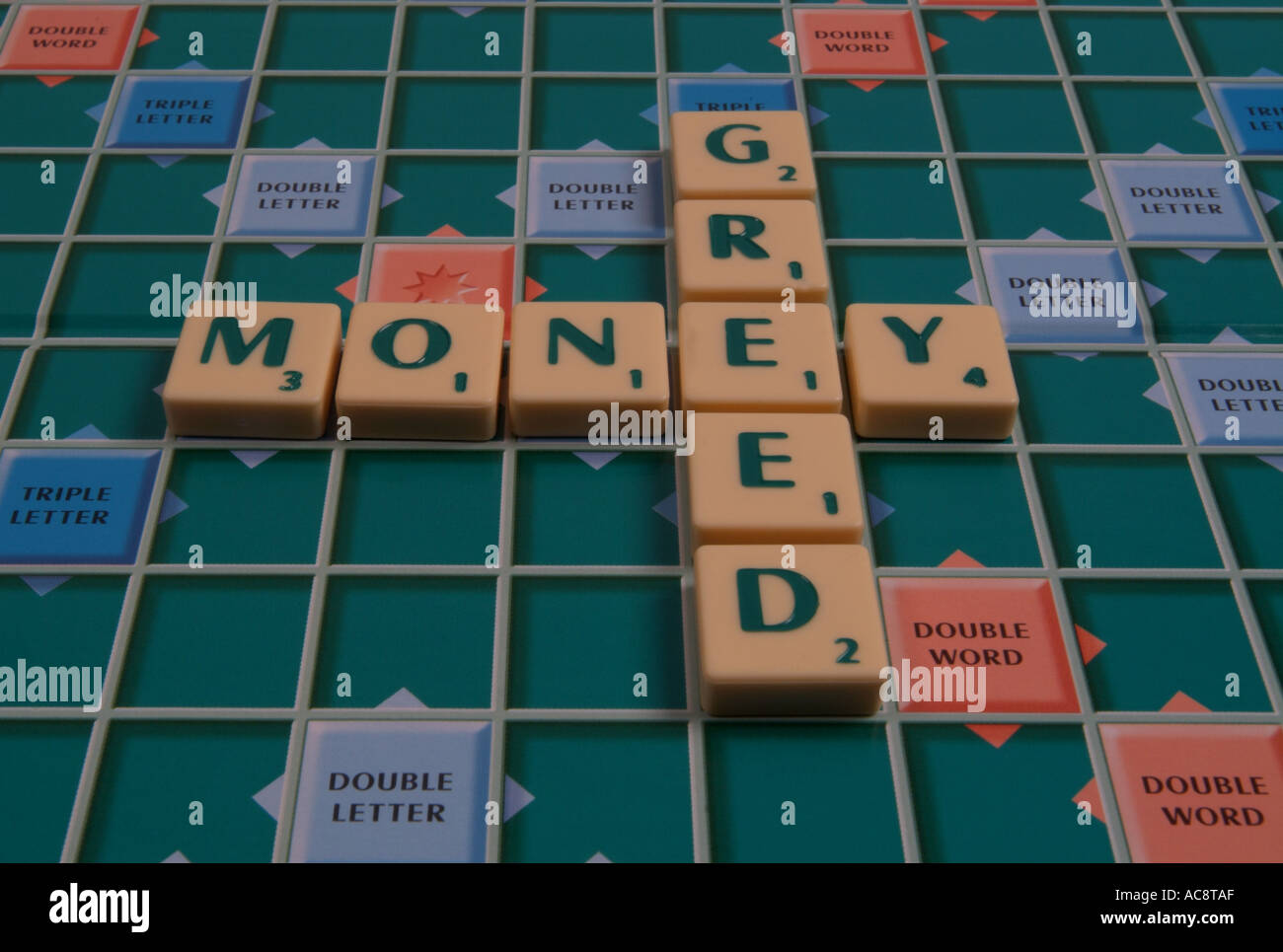 Money and Greed Stock Photo - Alamy