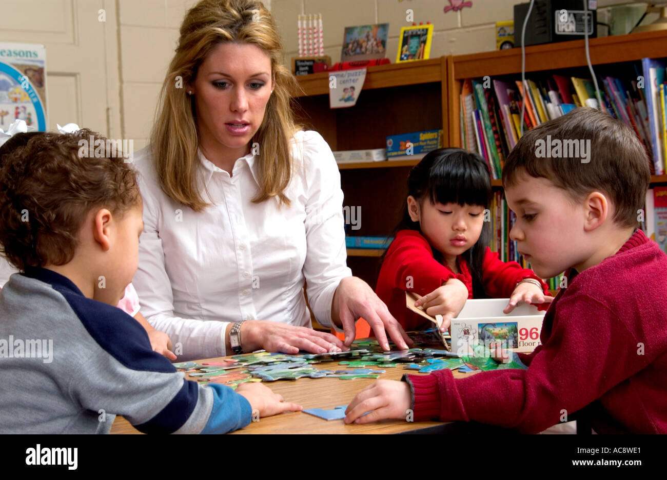Teacher with class Stock Photo - Alamy
