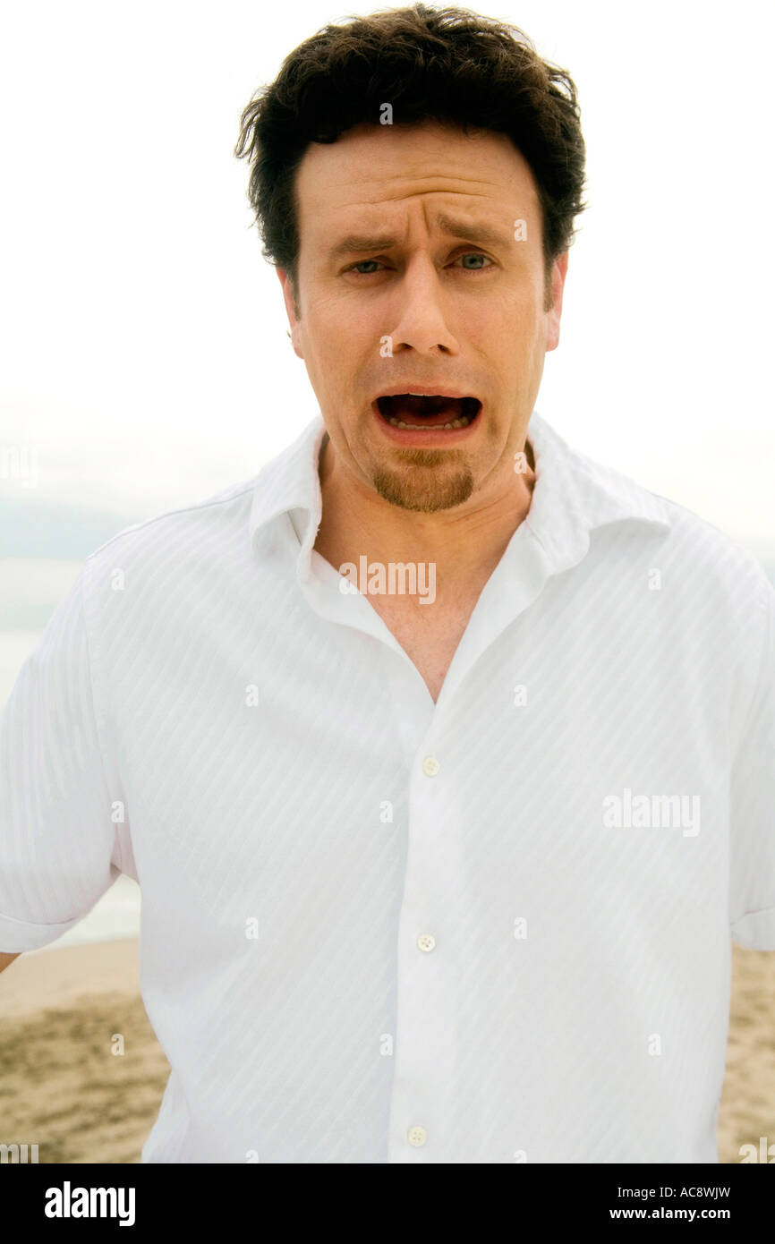 Portrait of a mid adult man crying Stock Photo - Alamy
