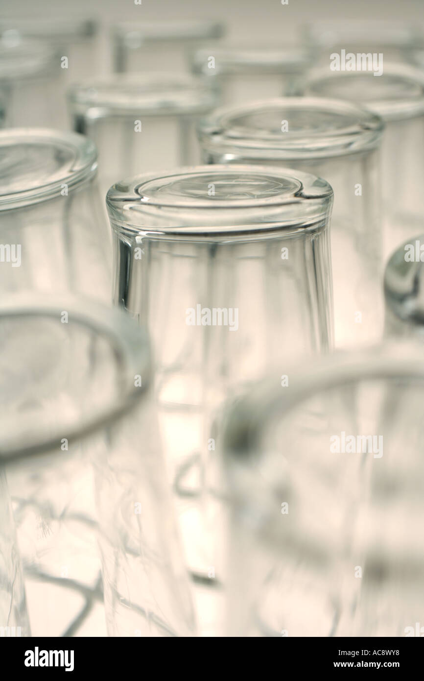 Clean pint glasses in an industrial dish washer, draining and drying ...