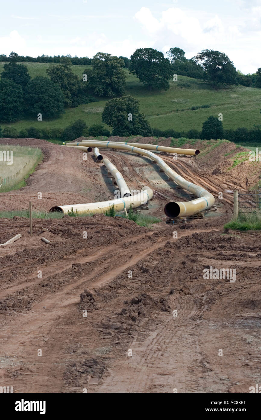 Laying new natural liquified gas pipeline through open countryside ...
