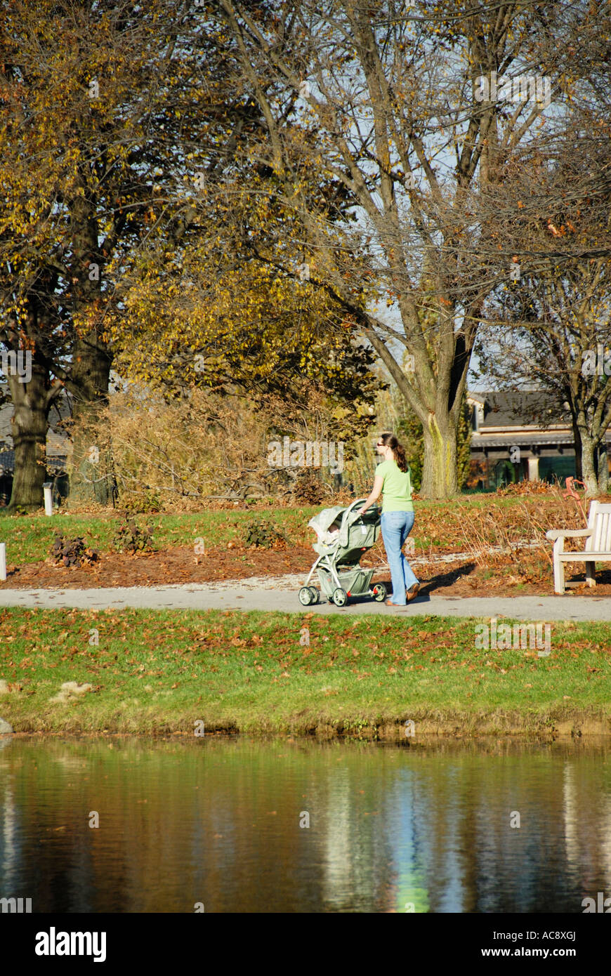 Woman, pushing Stroller Stock Photo - Alamy