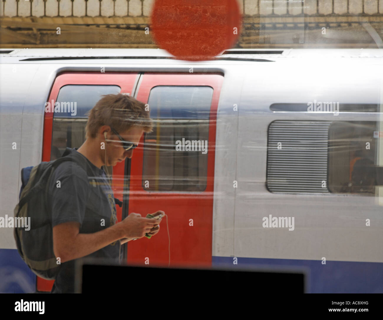 A Tube Train With Male Passenger London Uk Europe Stock Photo - Alamy