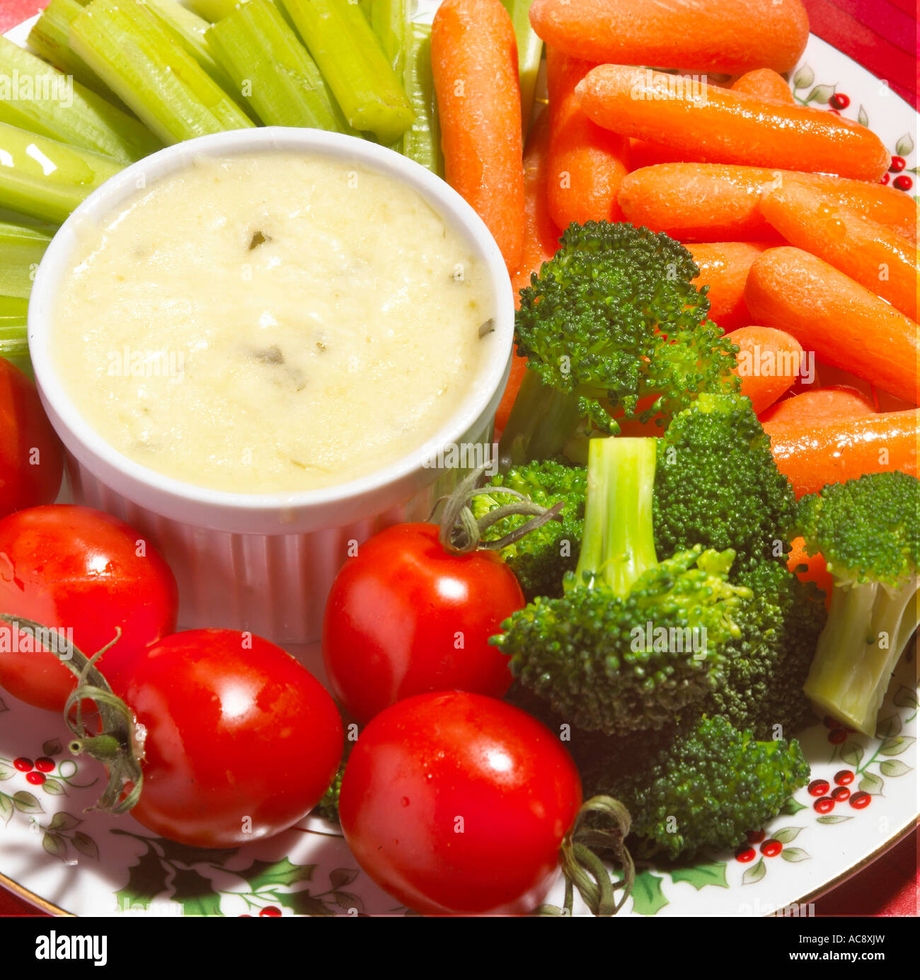 Vegetables with dip on a plate Stock Photo - Alamy