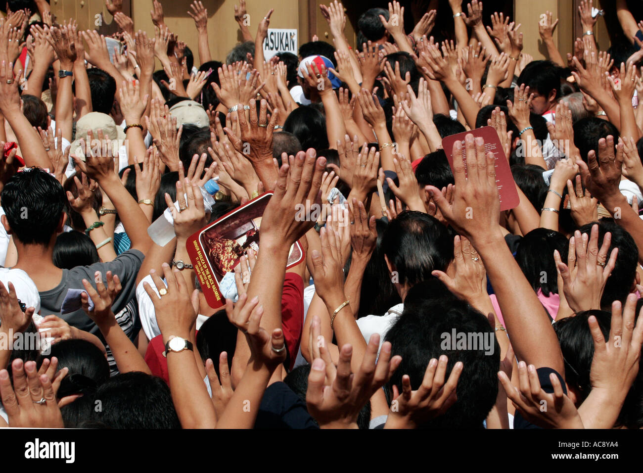 Church congregation raising hands, Quiapo, Manila, Philippines Stock ...