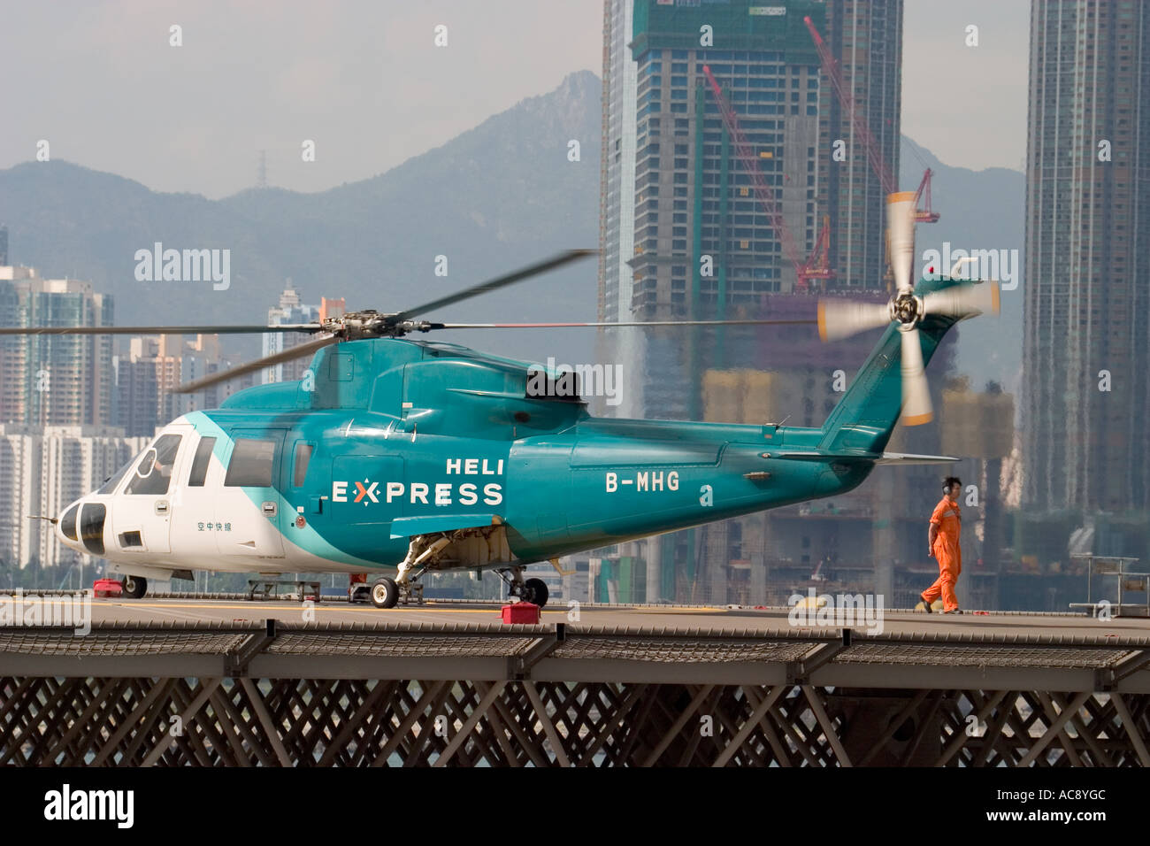 HeliJet Express helicopter lands or take off at heliport shun tak ...